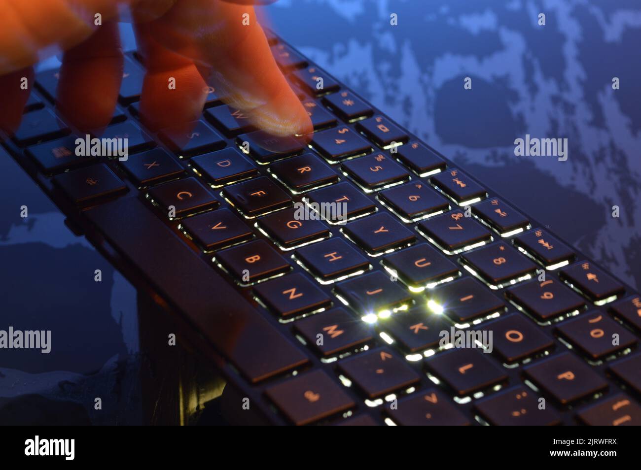 Moving fingers on computer keyboard Stock Photo - Alamy
