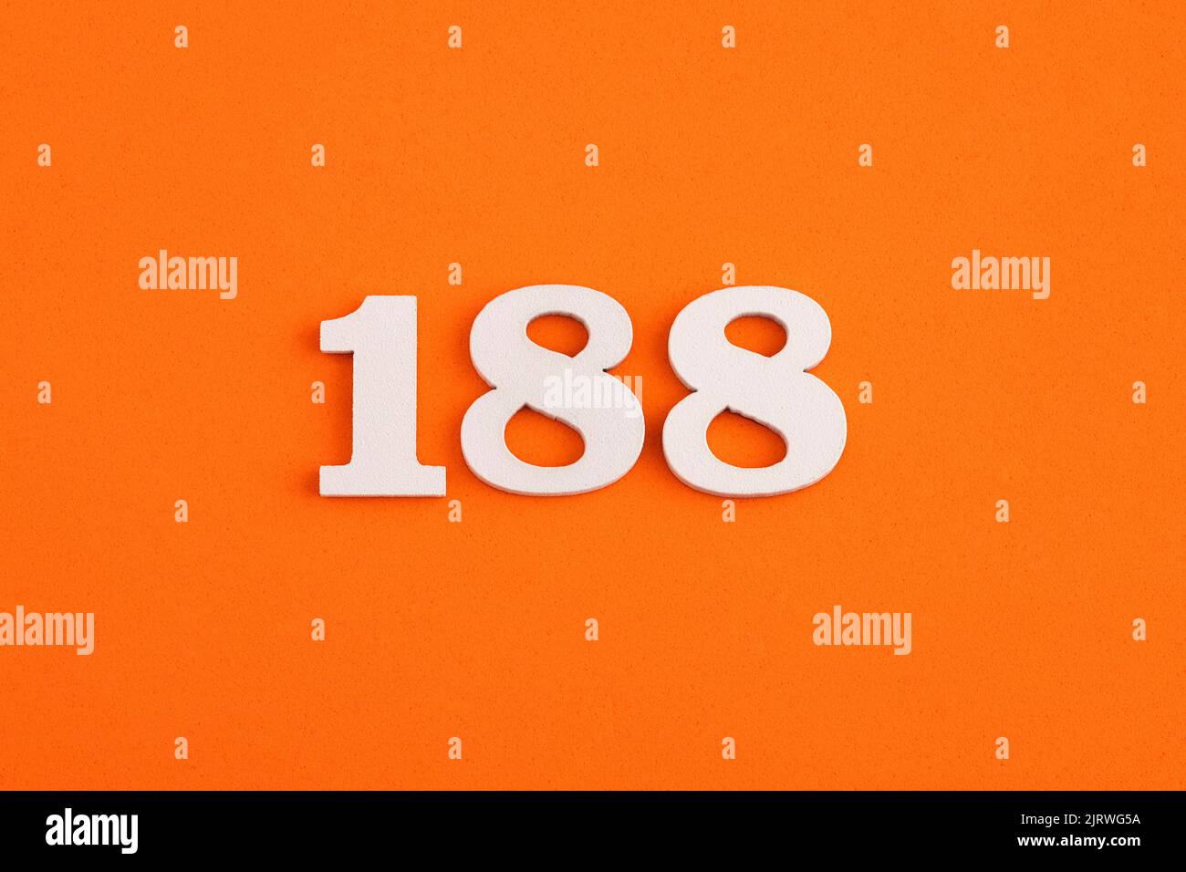 White wooden number 188 on eva rubber orange background Stock Photo - Alamy