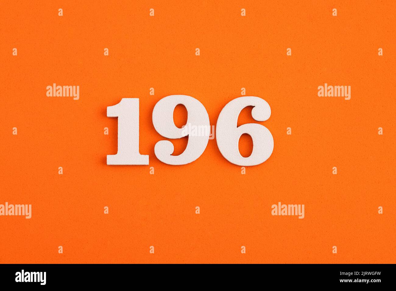 White wooden number 196 on eva rubber orange background Stock Photo - Alamy