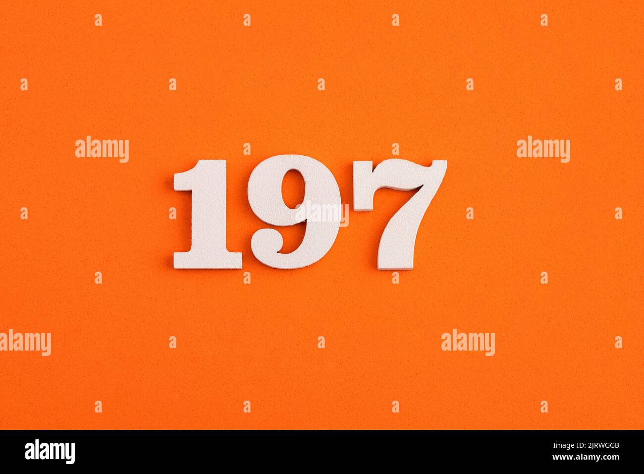 Number 197 - On orange foam rubber background Stock Photo - Alamy