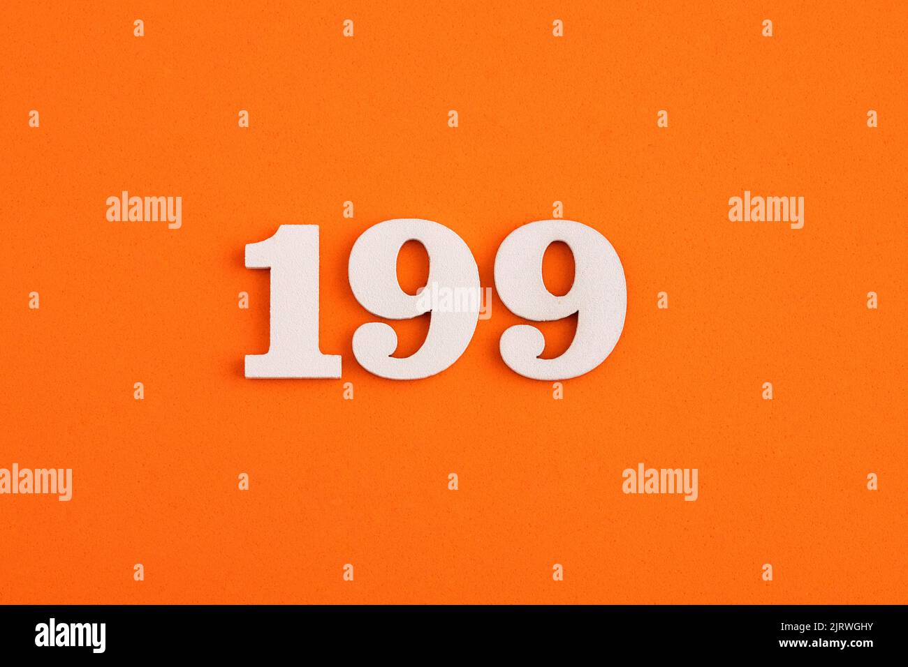 Number 199 - On orange foam rubber background Stock Photo - Alamy