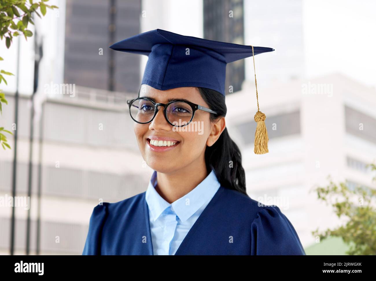 happy female graduate student in mortarboard Stock Photo - Alamy