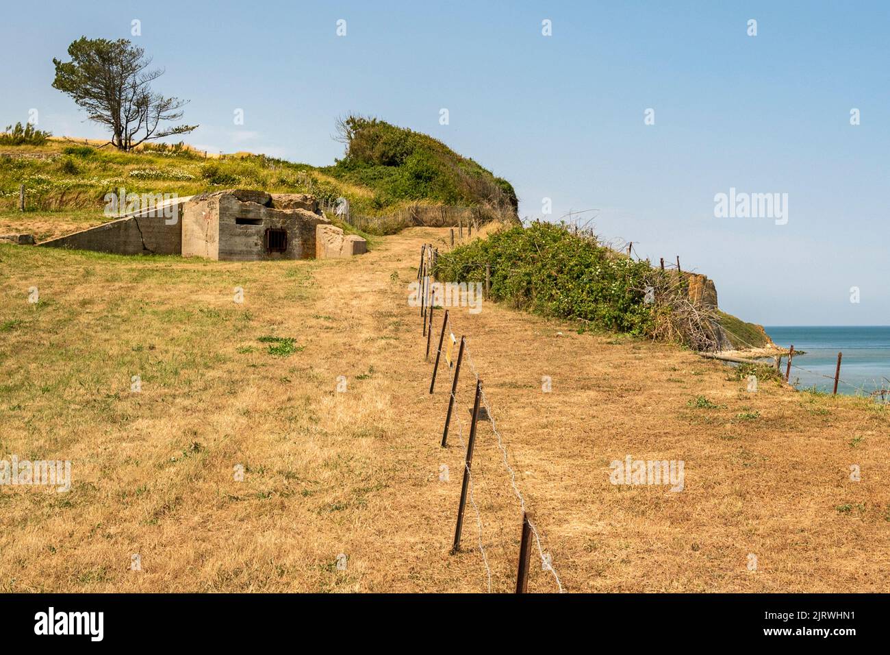 The ruins of the Atlantic wall at Arromanches at the D-Day coast of ...