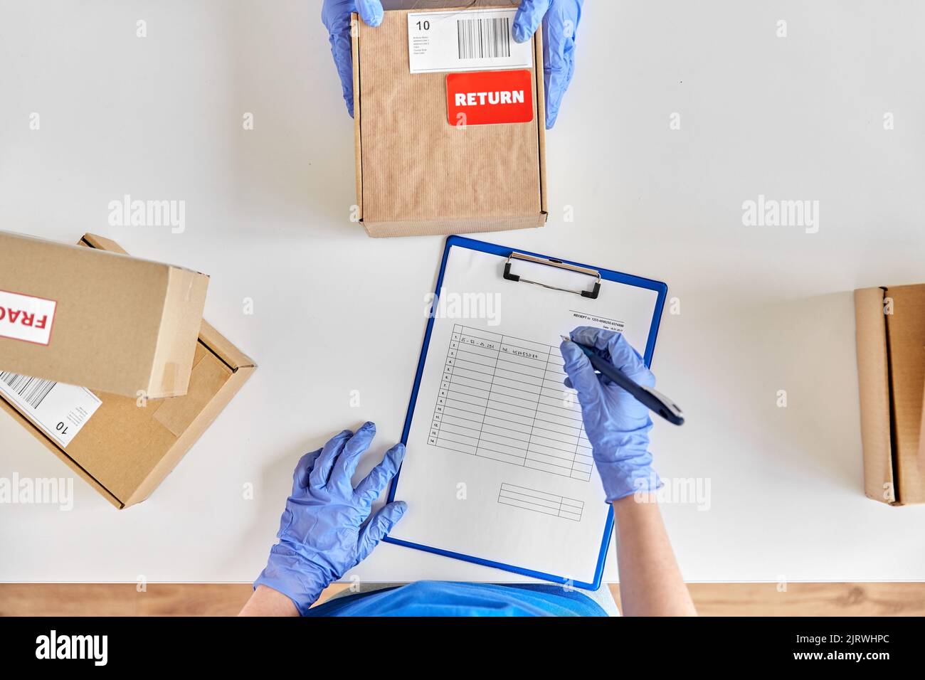 customer making return of parcel or purchase Stock Photo - Alamy