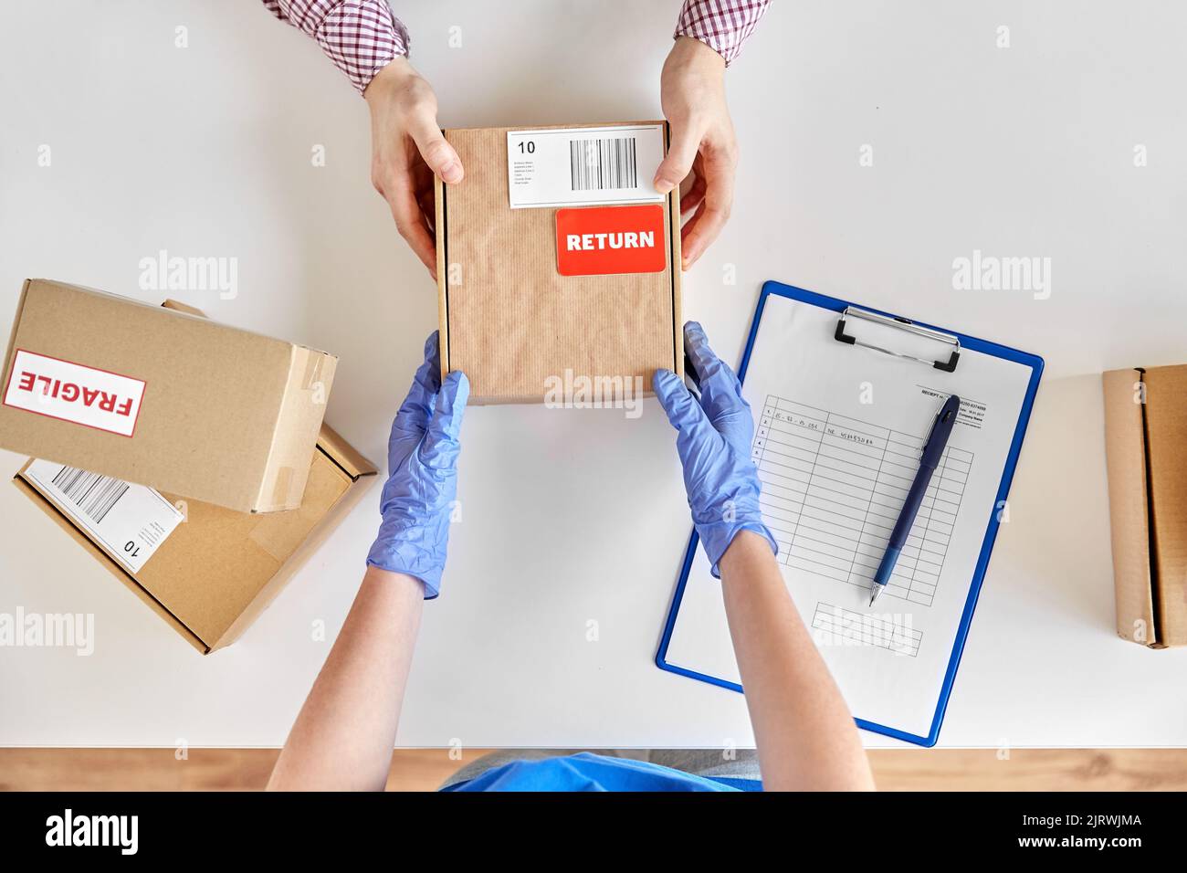 customer making return of parcel or purchase Stock Photo - Alamy