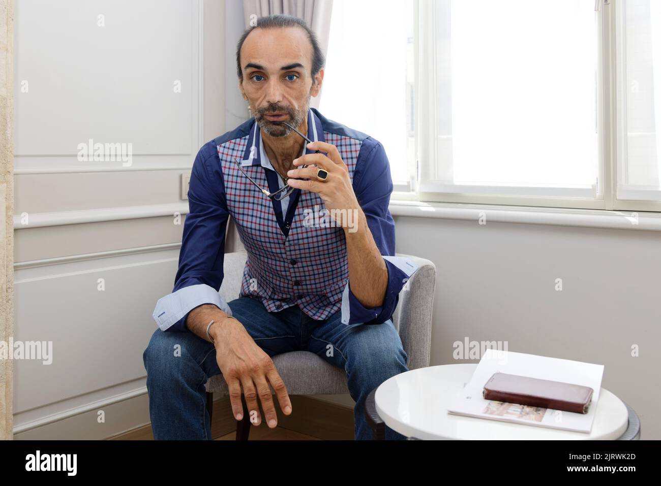 Paris, France. 20th Aug, 2022. Actor Alan M poses in a room at the ...