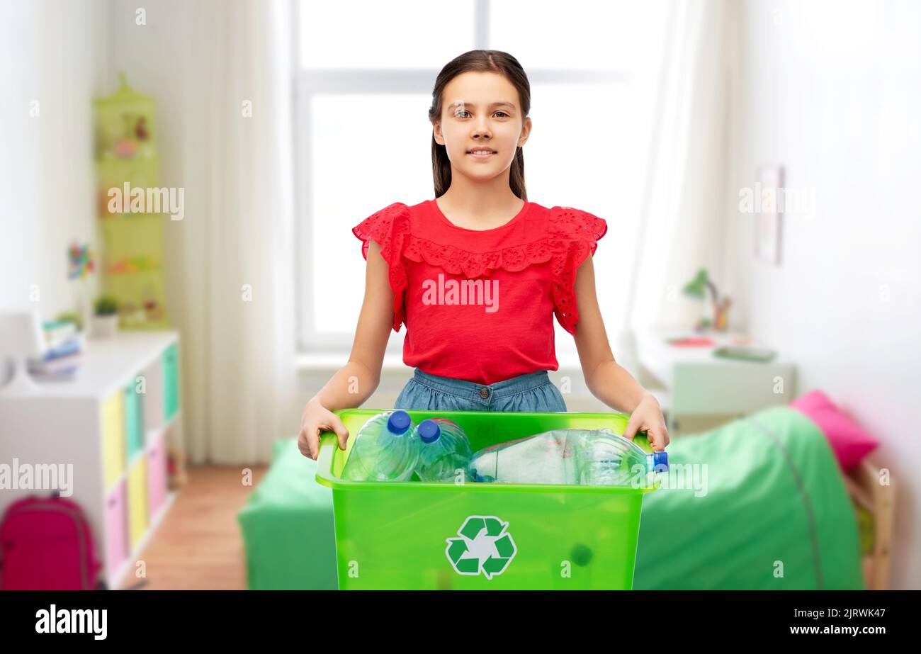 smiling girl sorting plastic waste Stock Photo - Alamy