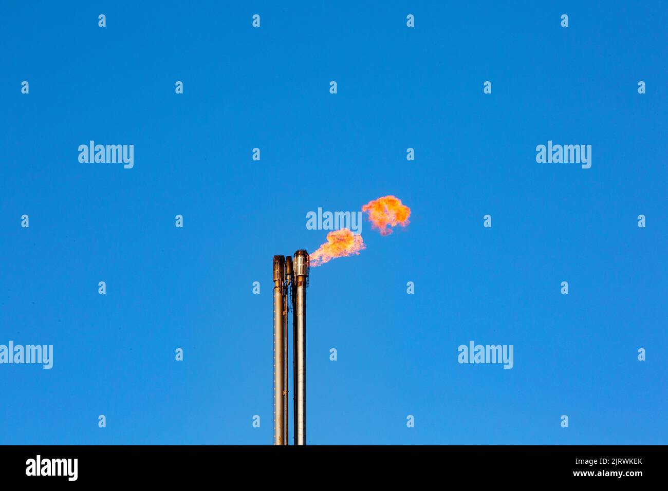 Burning Gas Flare In Oil Refinery Stock Photo - Alamy