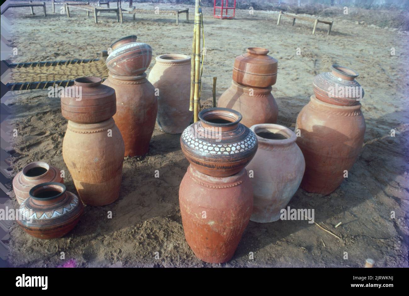 Filling water pots hi-res stock photography and images - Alamy