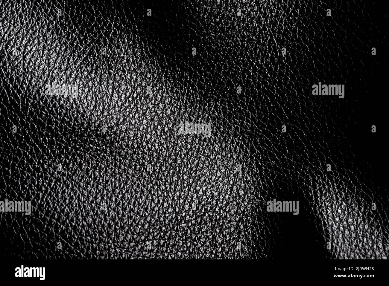 Black leather texture. Abstract background of dark leather with small ...