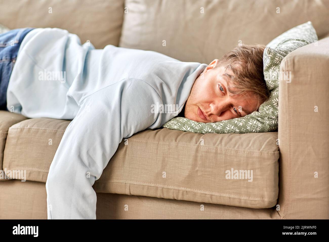 Bored young man home hi-res stock photography and images - Alamy