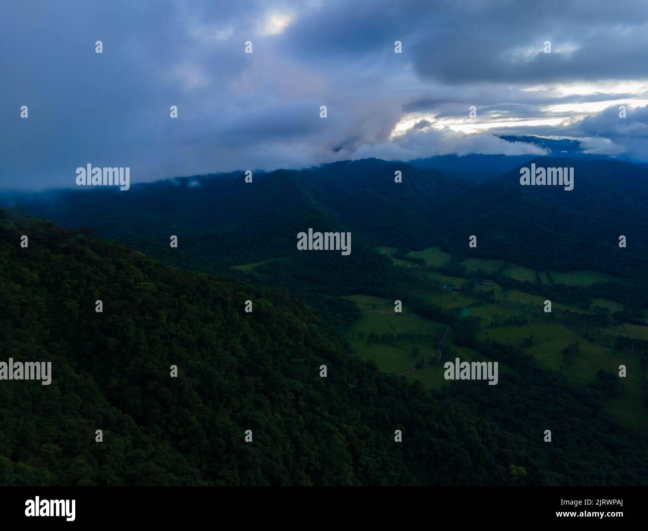 Beautiful aerial lview of Arenal Volcano, the arenal Lagoon, and rain ...