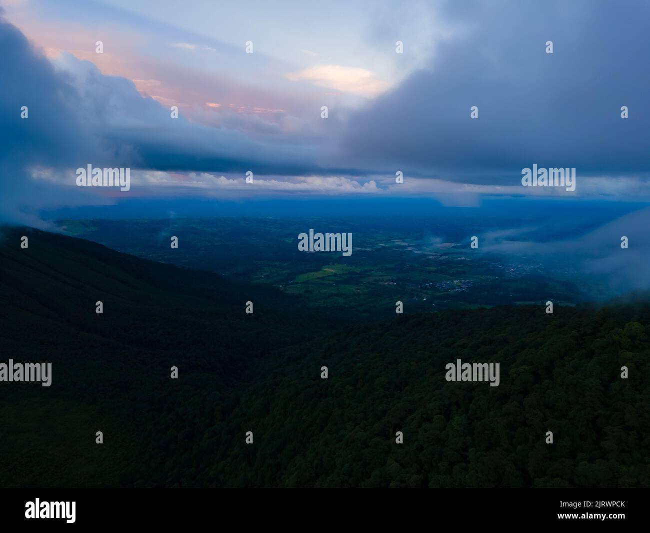 Beautiful aerial lview of Arenal Volcano, the arenal Lagoon, and rain ...