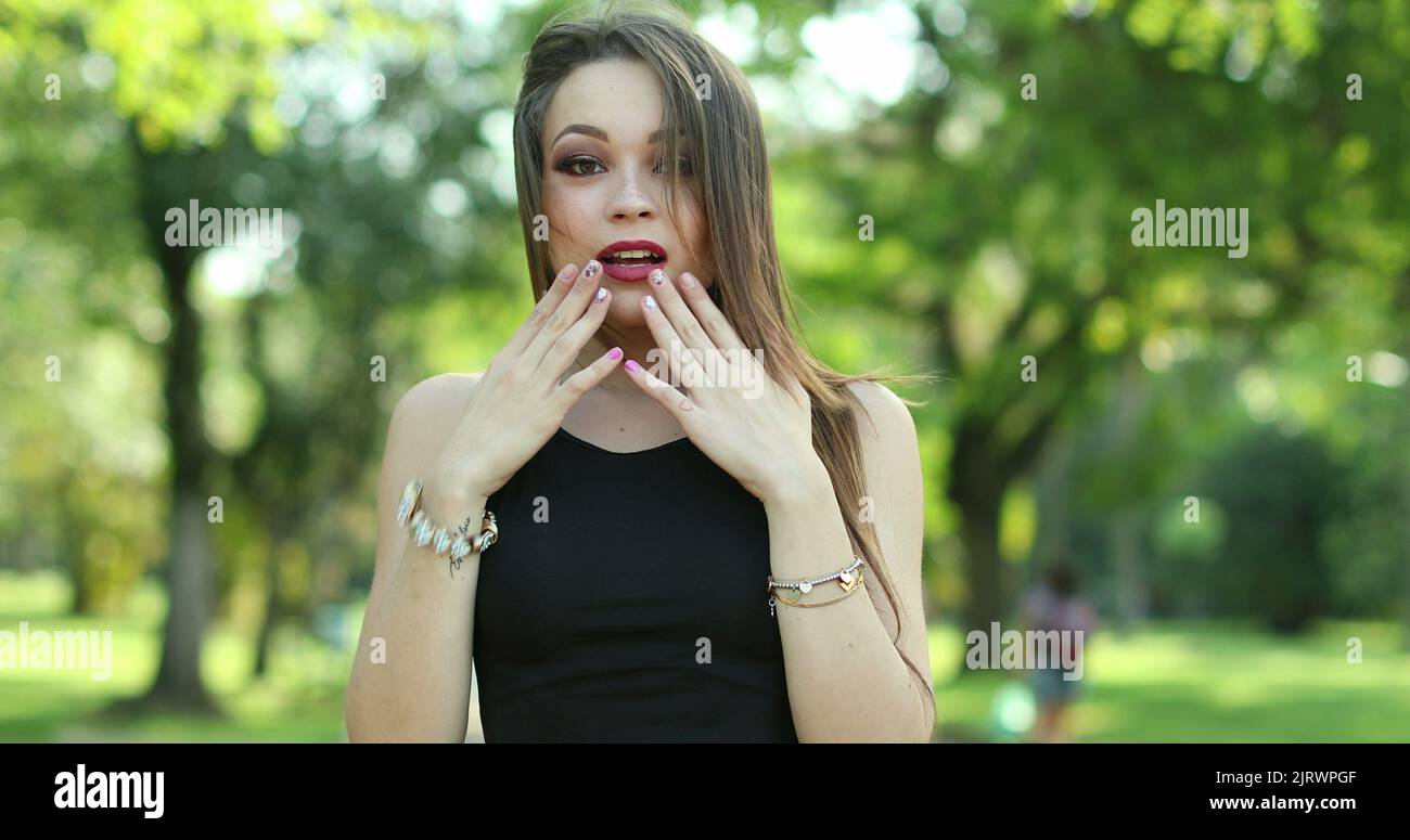 Girl reaction with suprise and shock looking to camera. Bewildered ...
