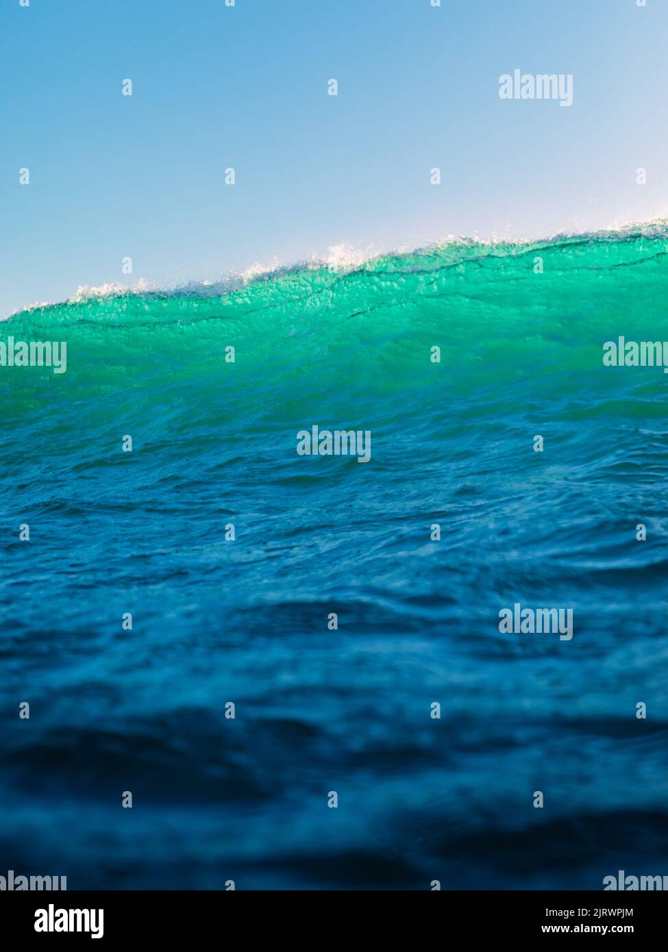 Perfect wave in ocean. Breaking turquoise wave with blue sky Stock ...