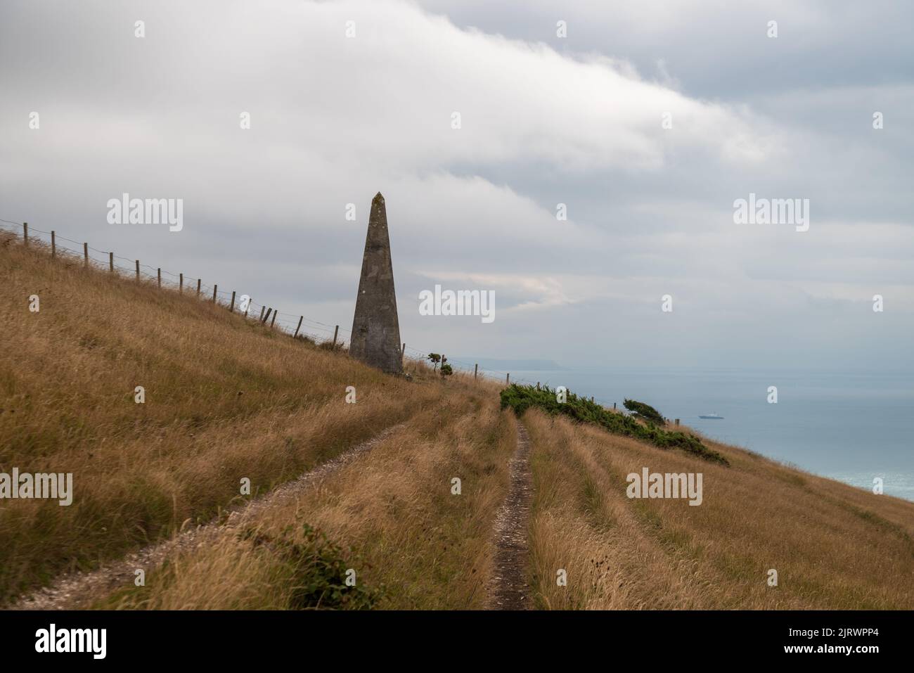 Triangular concrete obelisk at White Nothe on the Jurassic Coast ...