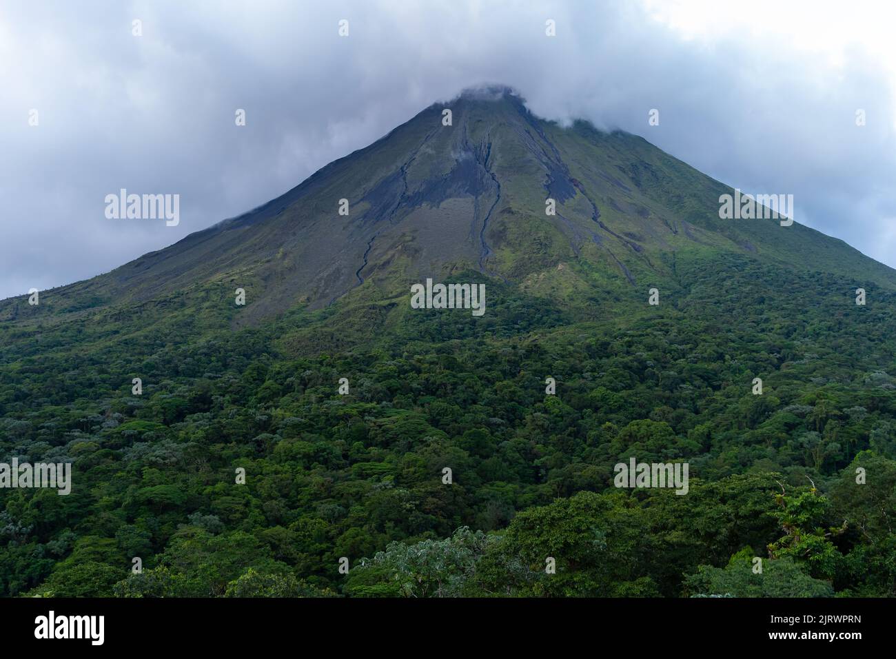 Beautiful aerial lview of Arenal Volcano, the arenal Lagoon, and rain ...