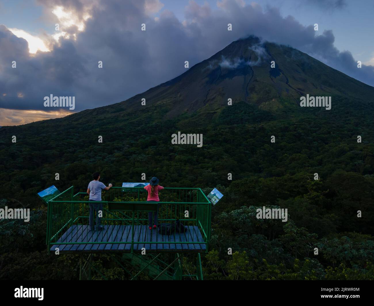 Beautiful aerial lview of Arenal Volcano, the arenal Lagoon, and rain ...