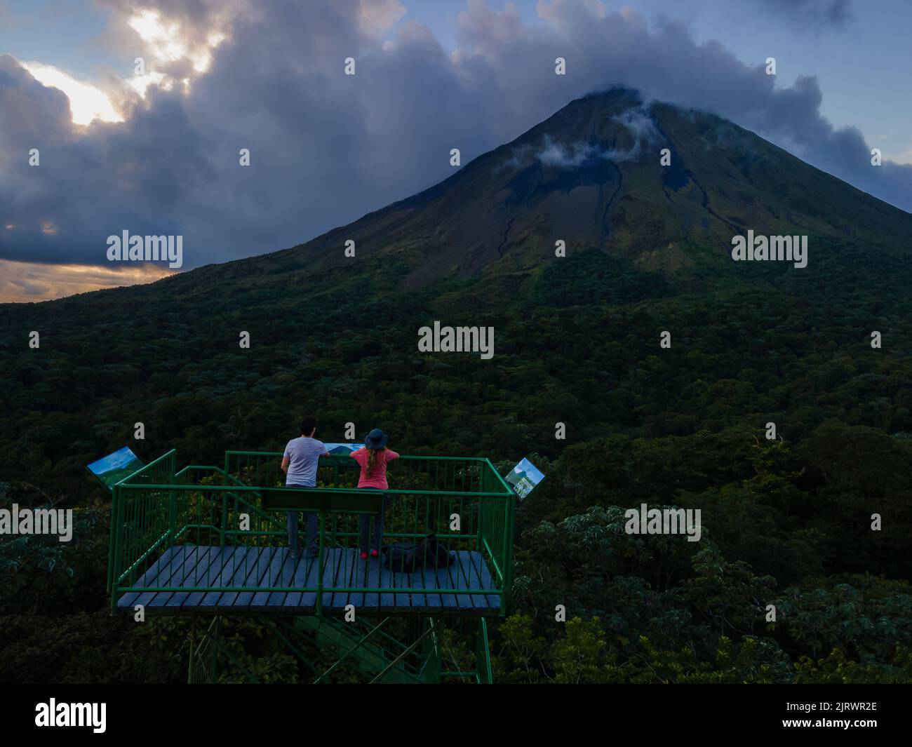 Beautiful aerial lview of Arenal Volcano, the arenal Lagoon, and rain ...