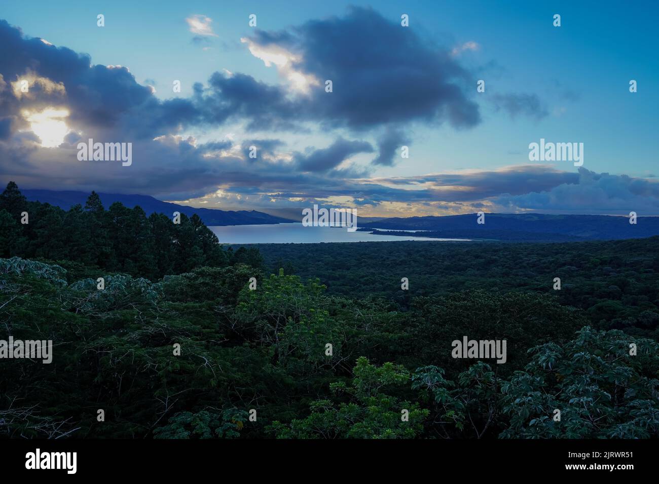 Beautiful aerial lview of Arenal Volcano, the arenal Lagoon, and rain ...