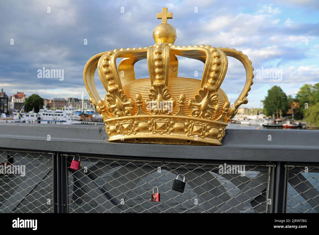 Gilded crown on Skeppsholmen Bridge in Stockholm Stock Photo - Alamy