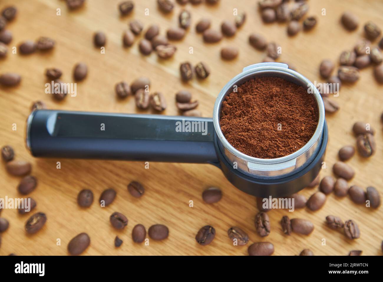 coffee machine horn, with ground coffee inside, against a background of ...