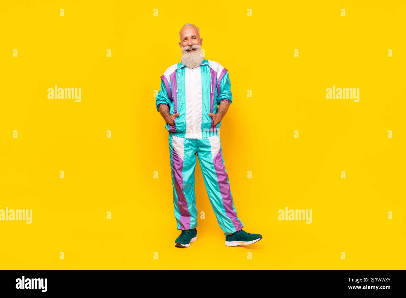 Full body portrait of cheerful aged man put hands pockets wear ...