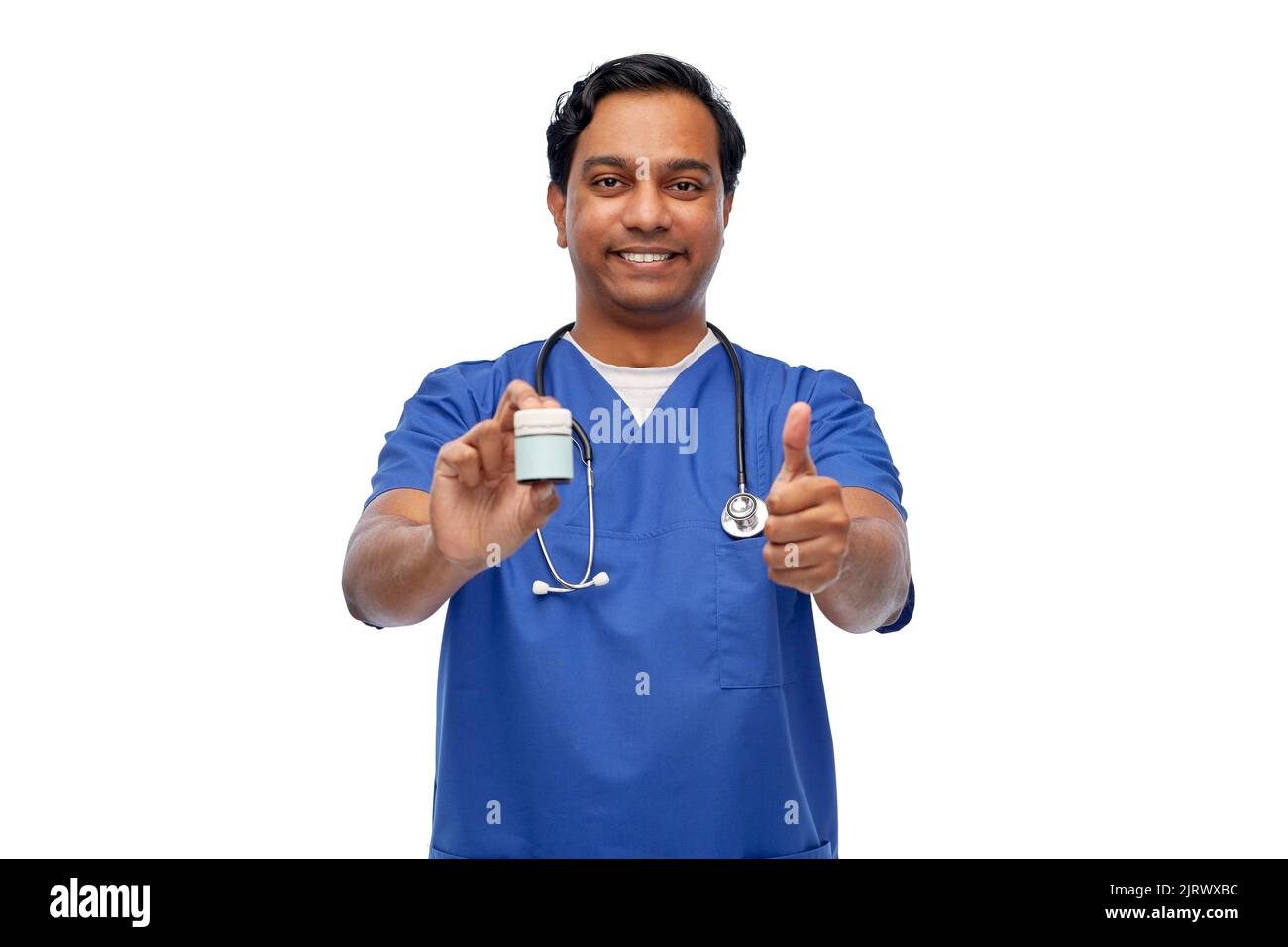 indian male doctor with medicine showing thumbs up Stock Photo - Alamy