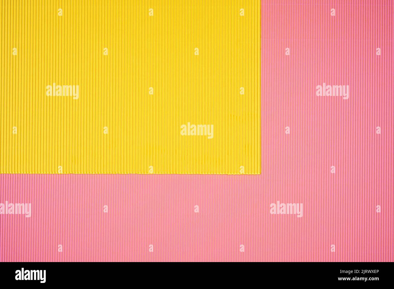 Pink and yellow two tone color paper background with stripes. Abstract ...