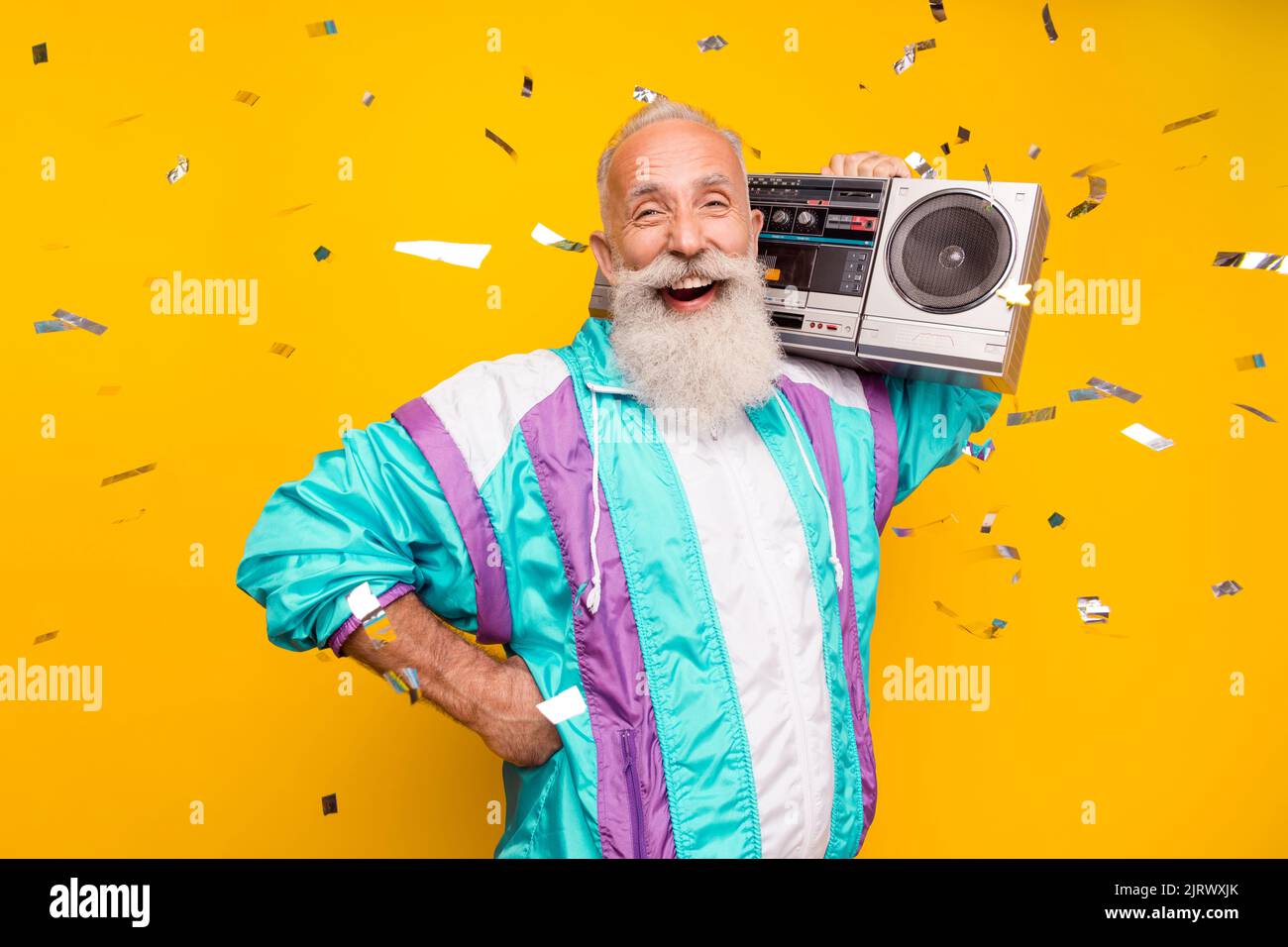 Portrait of funky positive granddad carry boom box have fun good mood ...