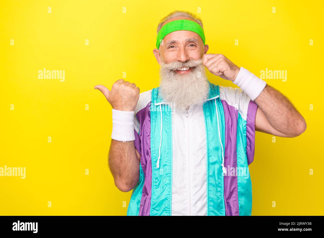 Portrait of positive handsome man hand touch adjust fix mustache direct ...