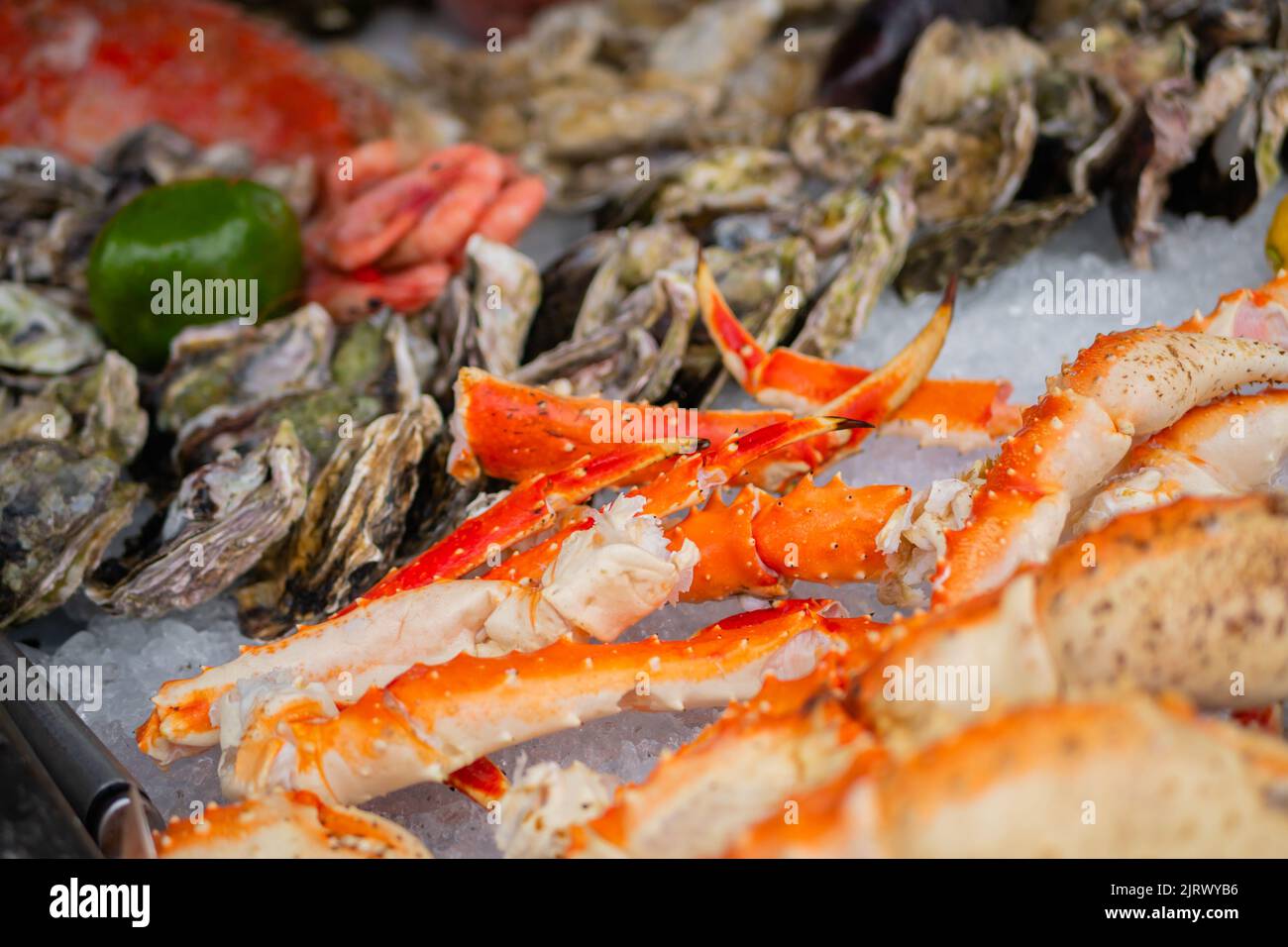Crab claws on counter at summer local fish market - close up Stock ...