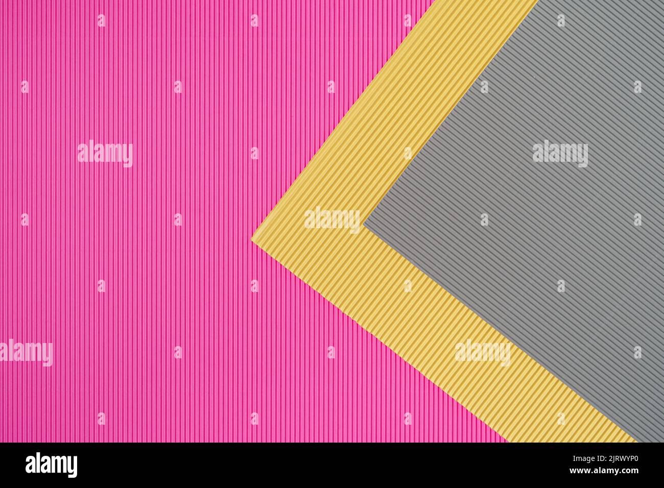 Gray, pink and yellow three tone color paper background with stripes ...