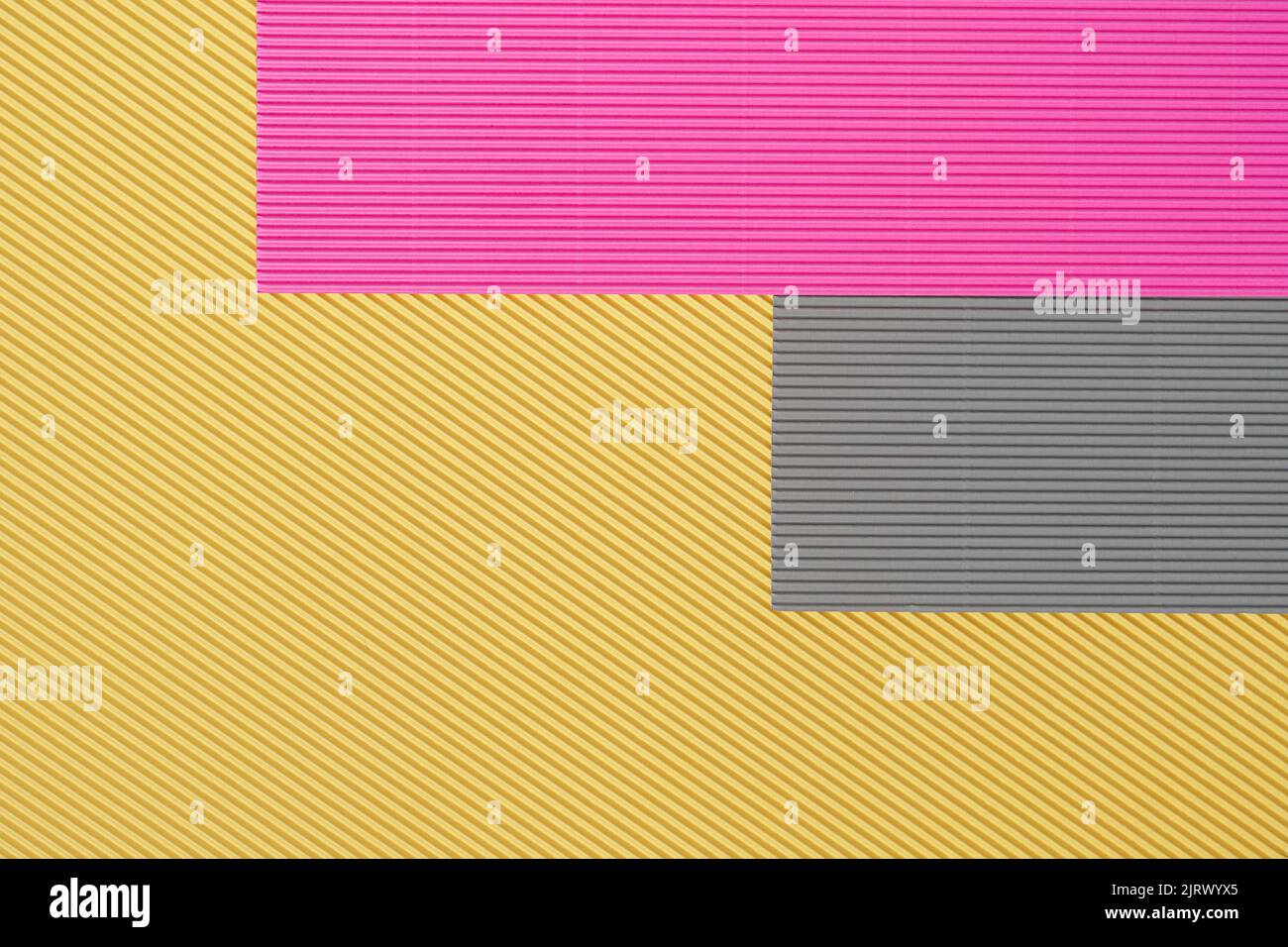 Gray, pink and yellow three tone color paper background with stripes ...