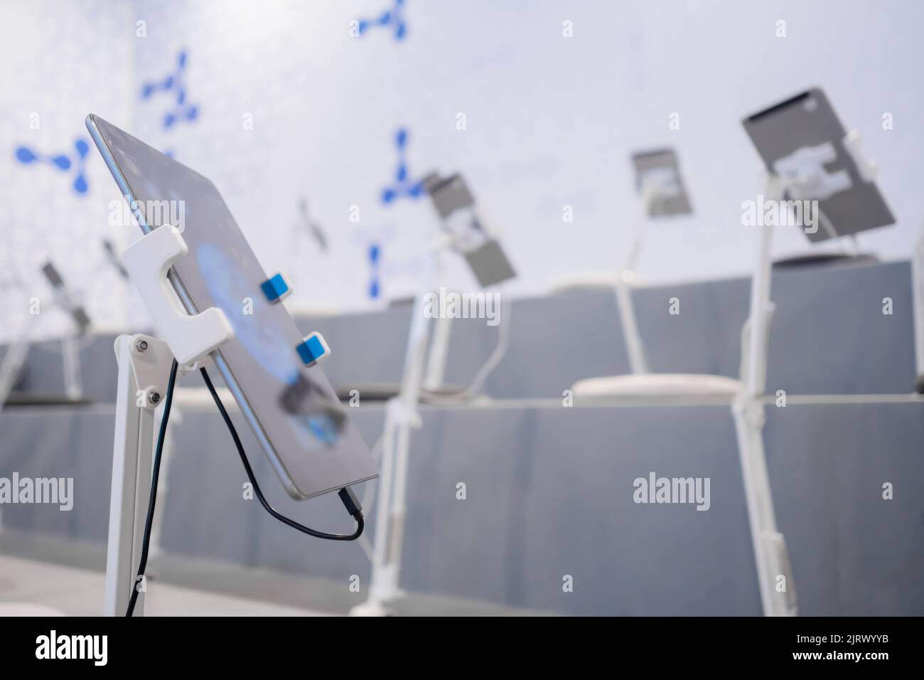 Many floor mount tablets at science exhibition, museum, auditorium or ...