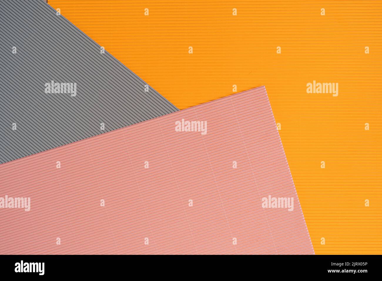 Gray, pink and orange three tone color paper background with stripes ...