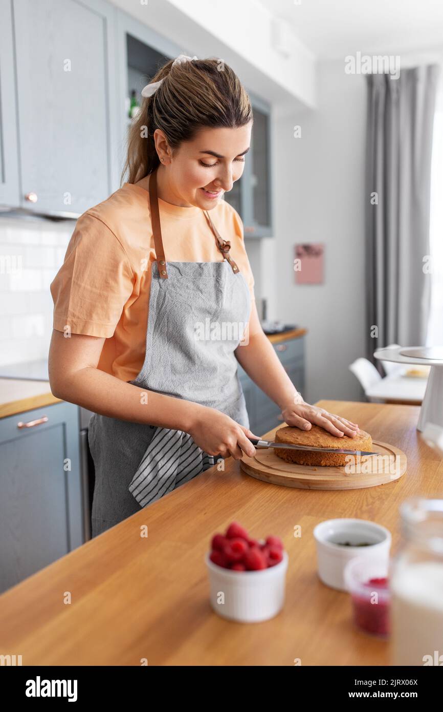 woman cooking food and baking on kitchen at home Stock Photo - Alamy