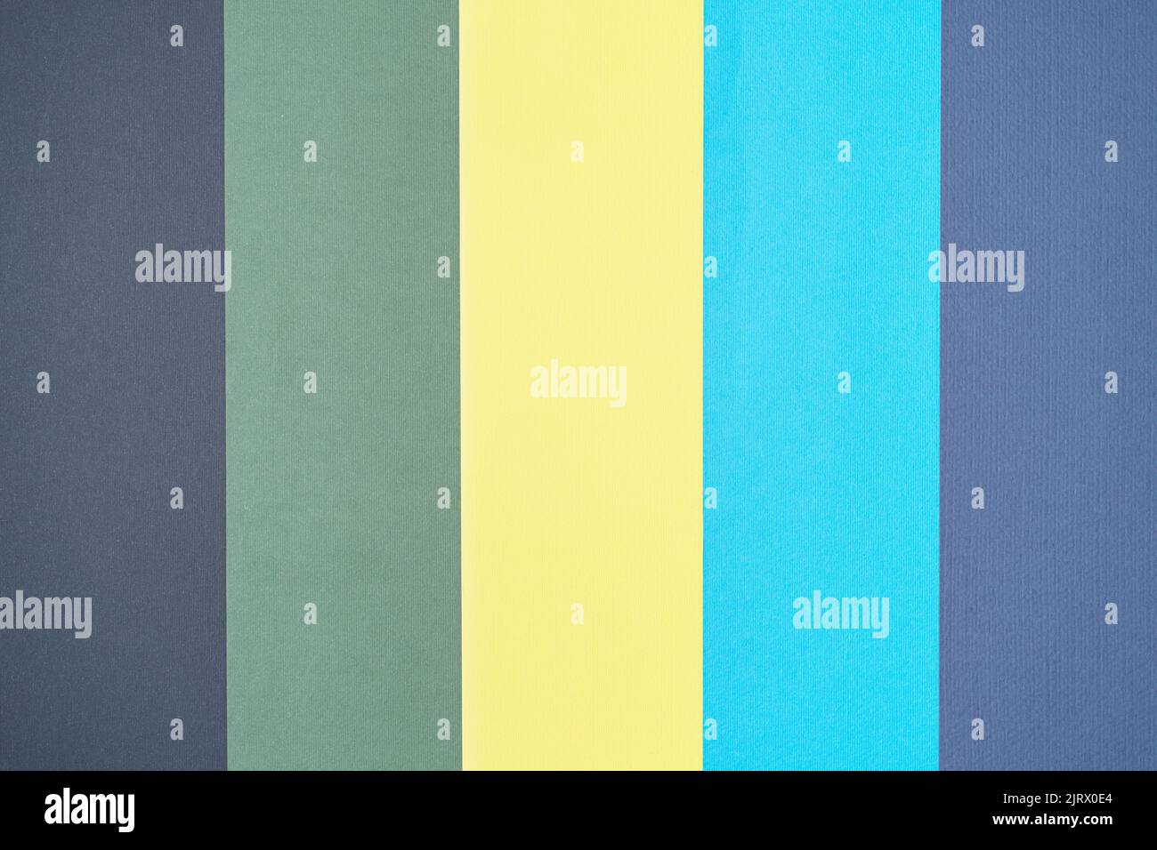 Blue, yellow, black, green, five tone color paper background with ...