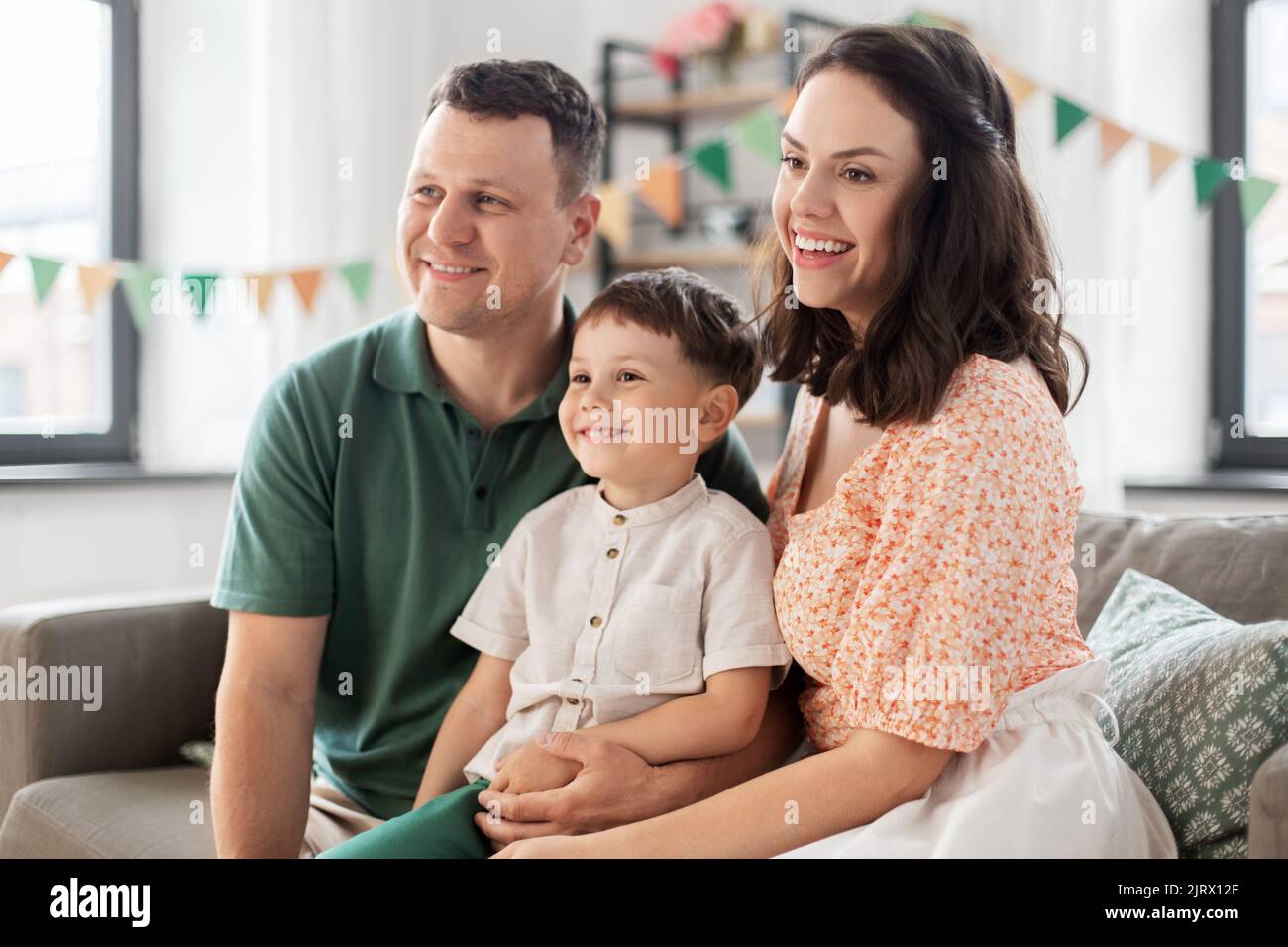 happy family with little son at birthday party Stock Photo - Alamy