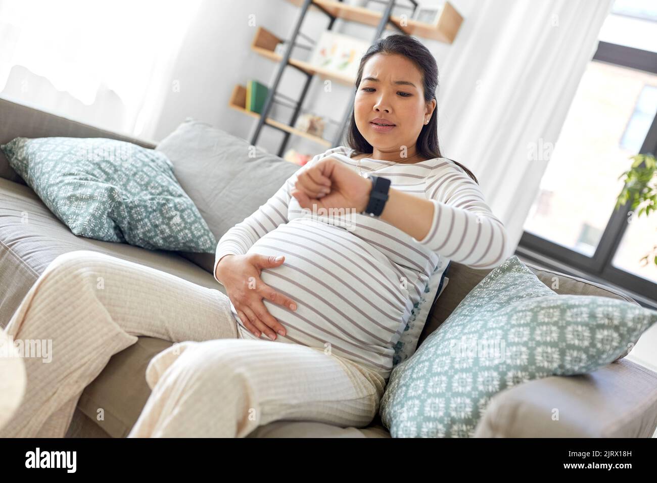 Pregnant woman having contractions hi-res stock photography and images ...