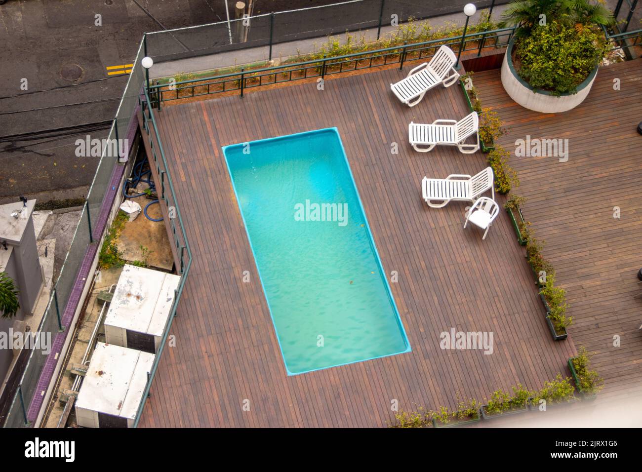 Swimming pool with wooden floors in São Paulo Brazil Stock Photo - Alamy