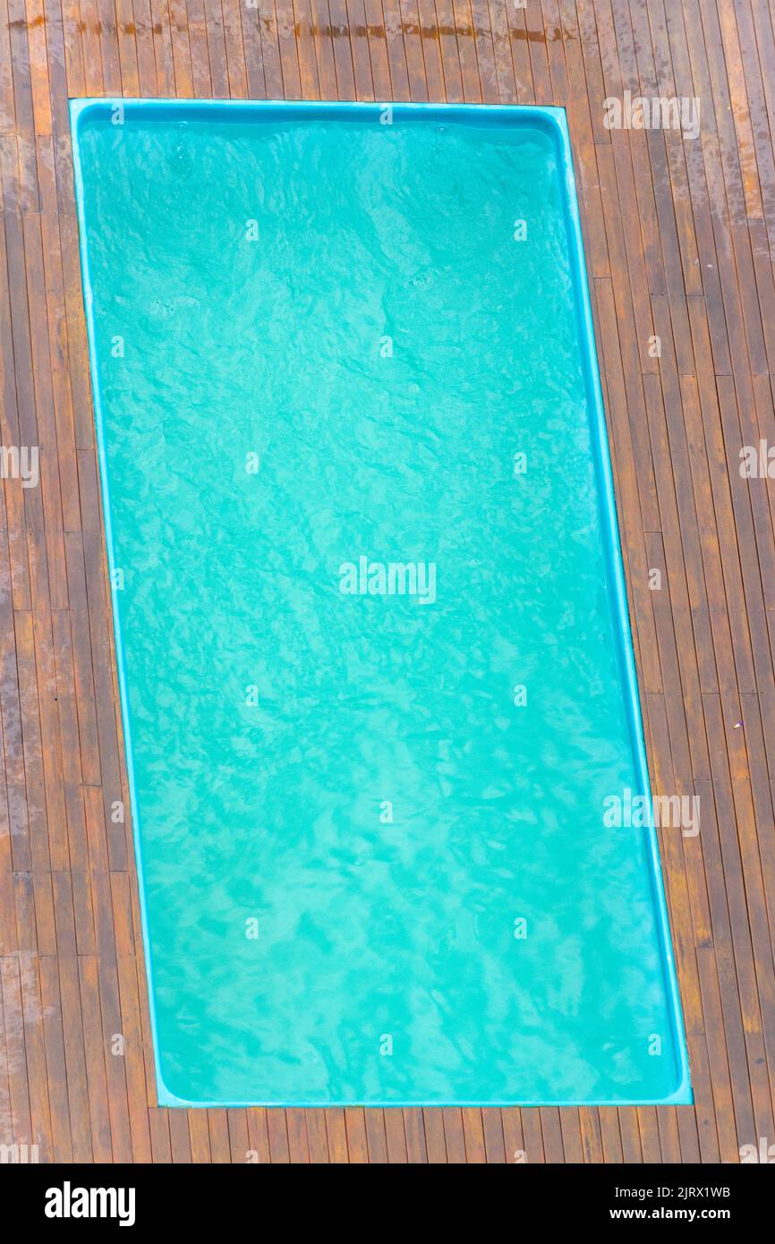 Swimming pool with wooden floors in São Paulo Brazil Stock Photo - Alamy