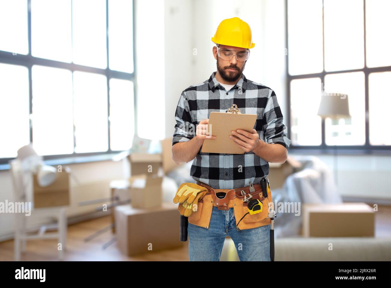 Man with clipboard house hi-res stock photography and images - Alamy
