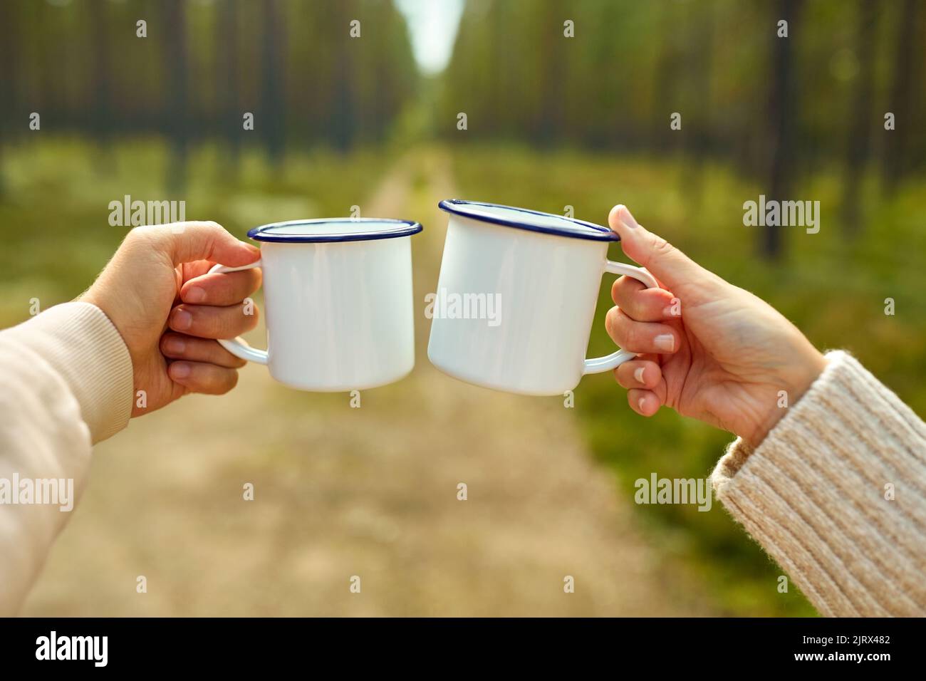 Couple drink coffee forest hi-res stock photography and images - Alamy