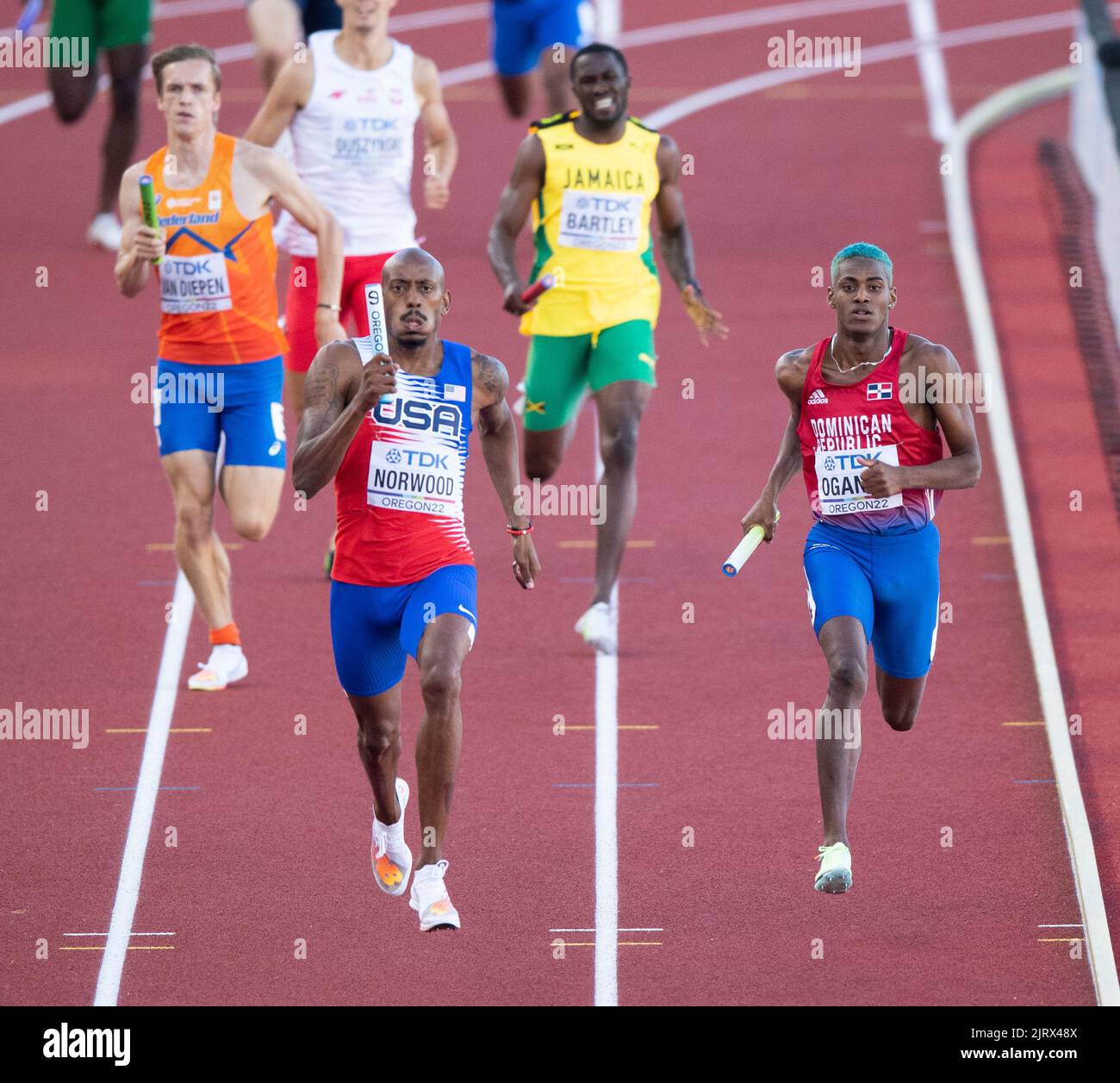Alexander Ogando and Vernon Norwood competing in the mixed relay final ...