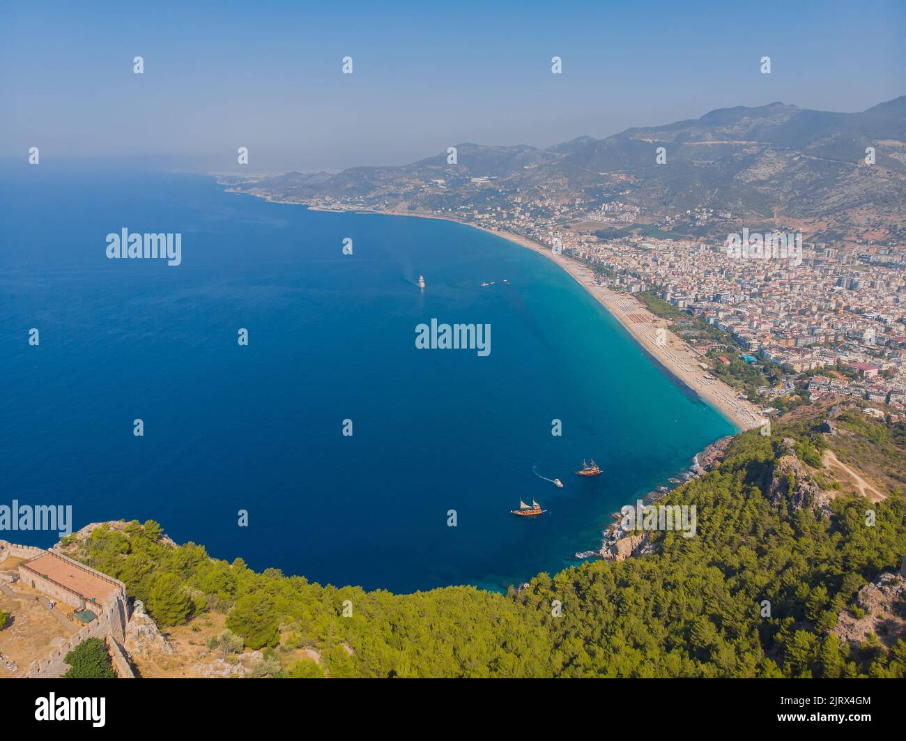 An aerial view of the bay Alanya in Antalya Turkey. Sea and city with ... An aerial view of the bay Alanya in Antalya Turkey. Sea and city with ...