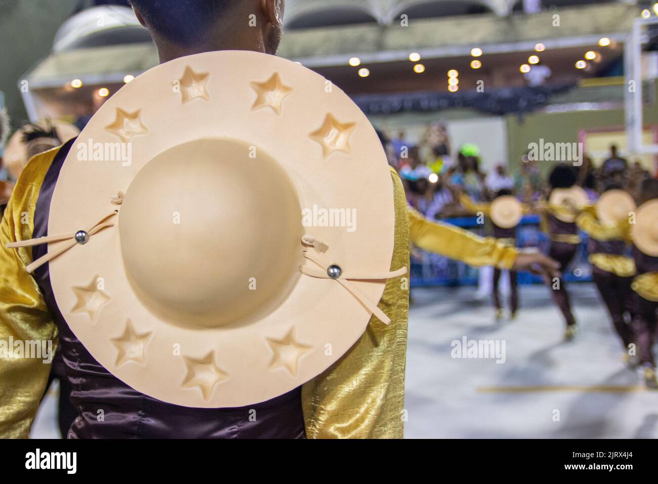 Passer with cangaceiro hat on his back during Rio de Janeiro Carnival ...