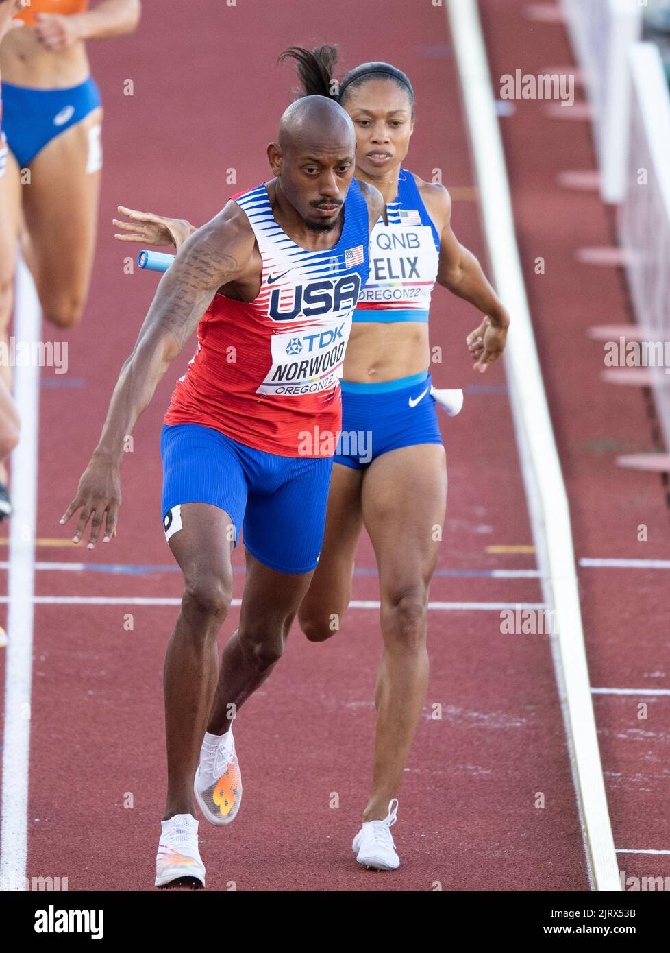 Allyson Felix and Vernon Norwood competing in the mixed relay final at ...