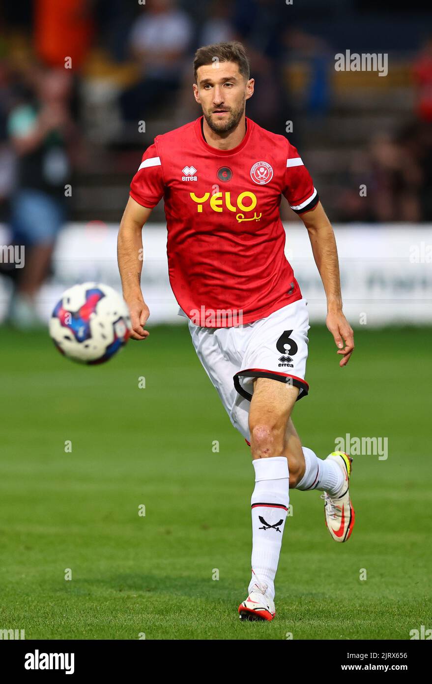 Luton, UK. 26th August 2022. Chris Basham of Sheffield Utd warms up ...