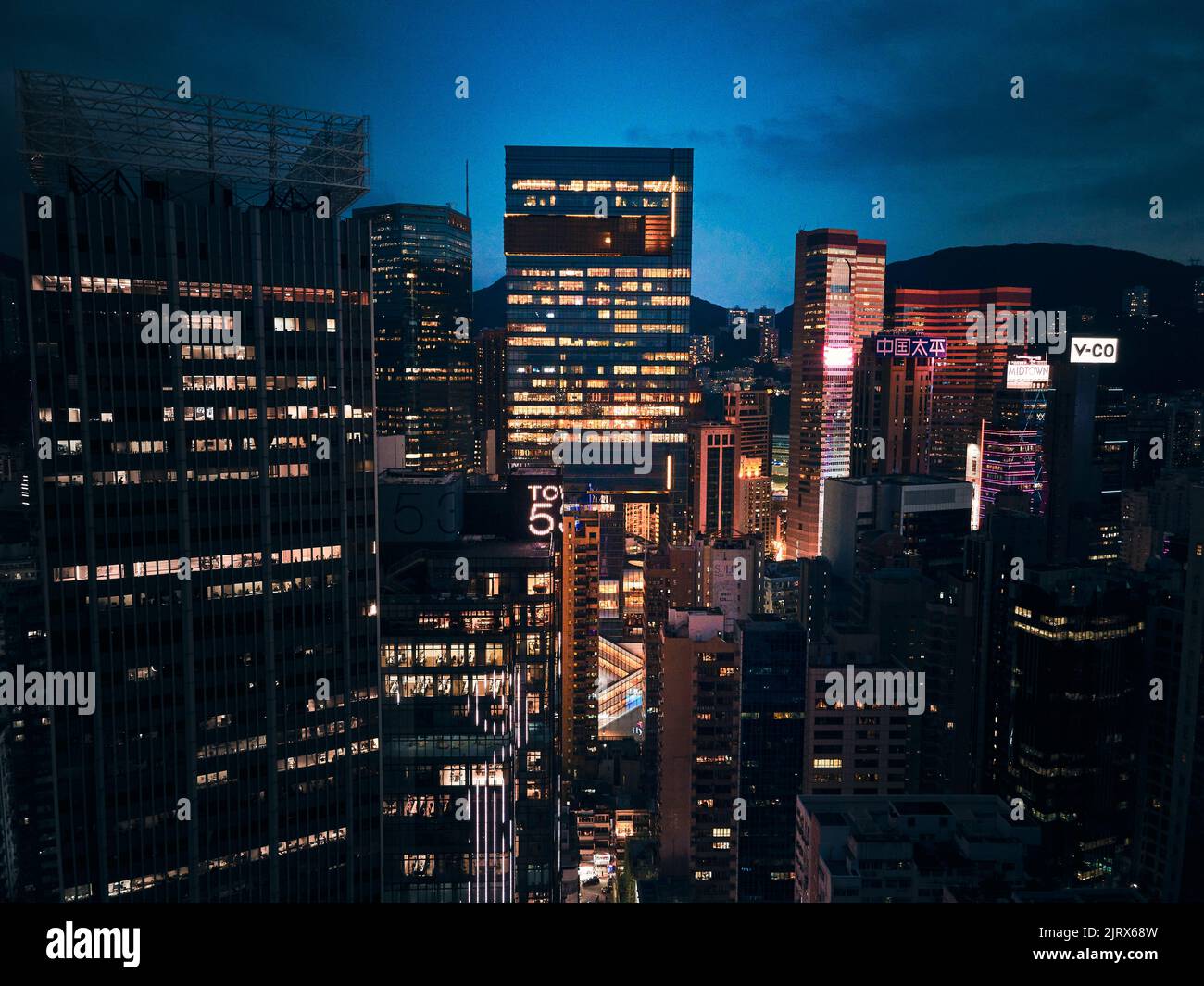The cityscape and the building of Hysan Place at night in Hong Kong ...
